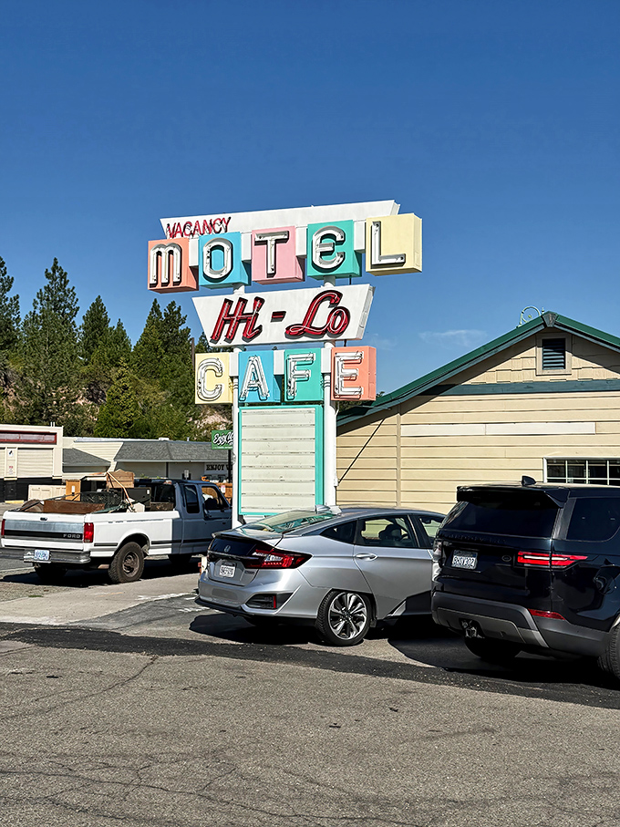 That vintage neon sign isn't just retro-cool&mdash;it's a legitimate time machine to when roadside caf&eacute;s were the backbone of American highway culture. Pure nostalgic perfection.
