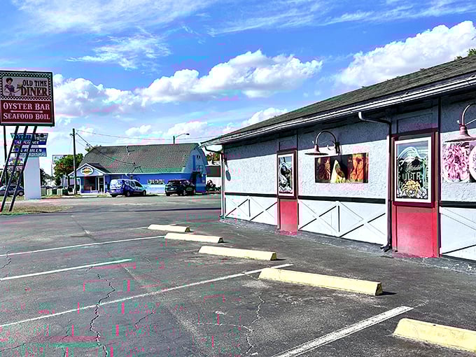 The Old Time Diner's exterior beckons like a lighthouse for hungry souls, promising comfort food salvation in Leesburg's sea of chain restaurants.