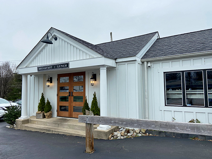 Morning sunshine highlights the simple elegance of this breakfast sanctuary. The sign says it all: this place knows exactly what it's about.