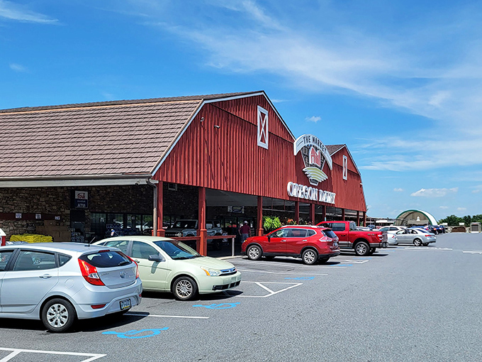 The iconic red barn exterior of Oregon Dairy welcomes hungry travelers like a beacon of comfort food hope in Lancaster County's rolling countryside.