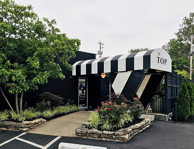Surrounded by lush landscaping, the distinctive awning announces your arrival at a Columbus institution where steak dreams come true.