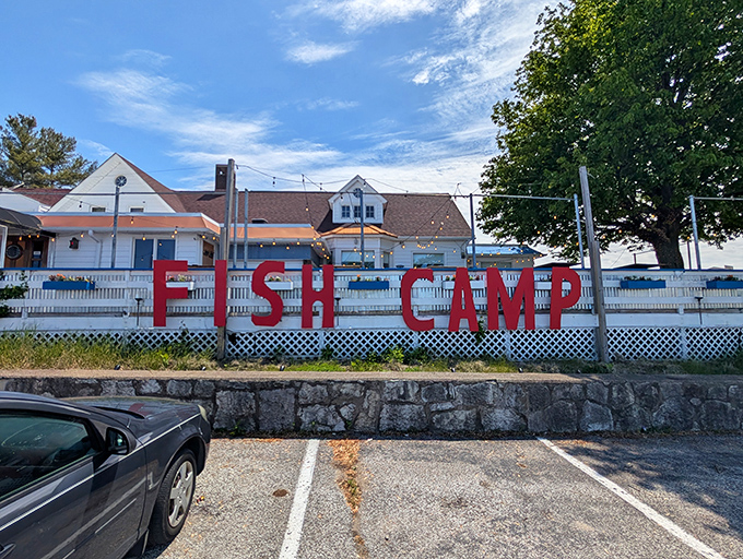 The white clapboard exterior with those bold red "FISH CAMP" letters is like a siren call to seafood lovers. Maritime charm meets Midwest hospitality right on Michigan City's waterfront.