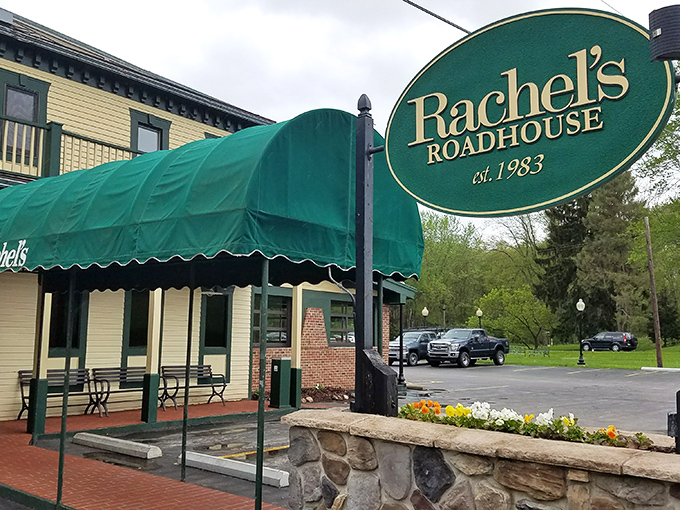 The iconic green awning of Rachel's Roadhouse welcomes hungry travelers like a beacon of culinary comfort in Mercer. No fancy frills needed when the food speaks this loudly.