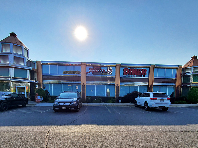 Morning sunlight bathes the Nautilus Diner in golden warmth, transforming this roadside eatery into a beacon of breakfast possibility.