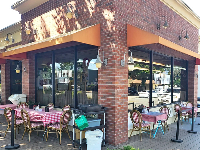 The brick exterior of Way Station Coffee Shop beckons like an old friend, complete with those charming red-checkered tablecloths that practically whisper, "Sit down, stay awhile."