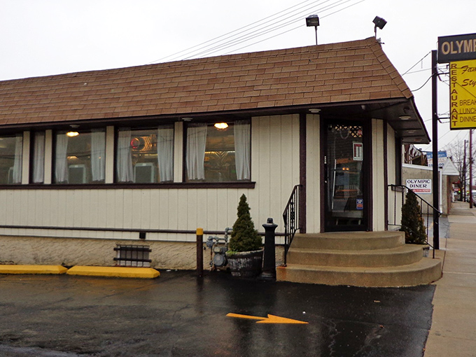 The unassuming exterior of Olympic Diner stands like a time capsule on Baltimore Pike, proving that culinary treasures often hide in plain sight.