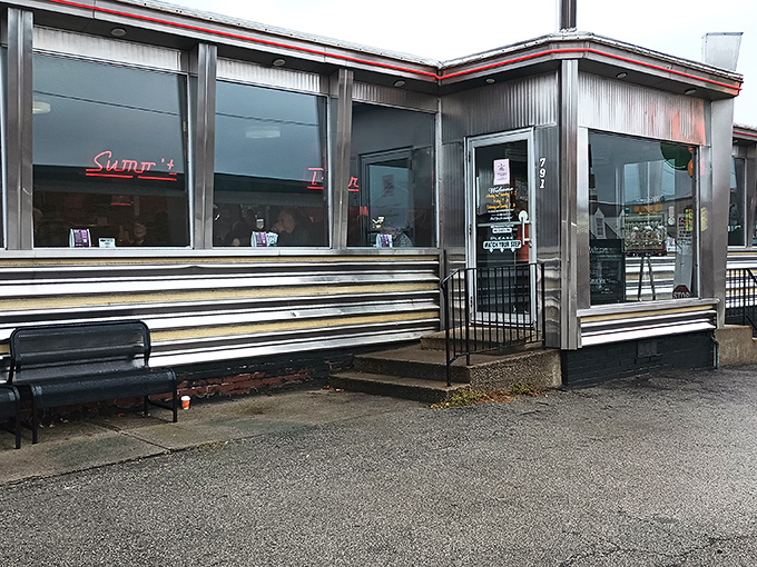 The gleaming stainless steel exterior of Summit Diner stands as a beacon of hope for hungry travelers&mdash;a chrome time machine promising delicious possibilities inside.