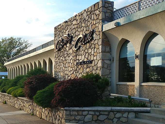 The stone facade of Country Club Diner stands like a mid-century monument to comfort food, promising delicious memories before you even step inside.