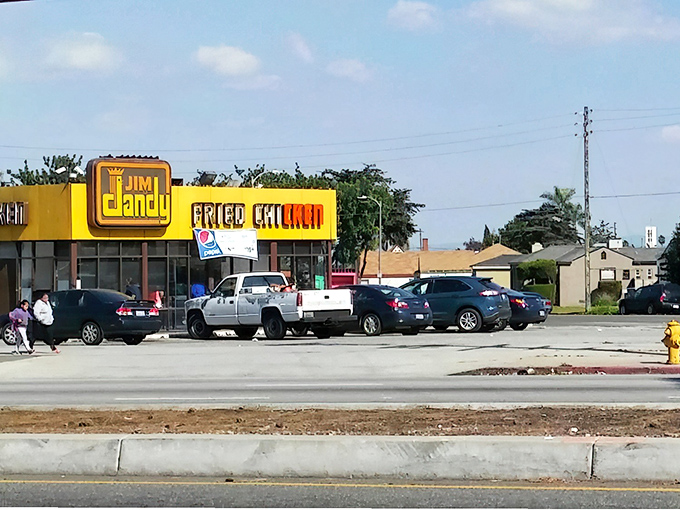 The unmistakable yellow facade of Jim Dandy stands like a beacon of comfort food in South LA, promising crispy salvation to hungry travelers.