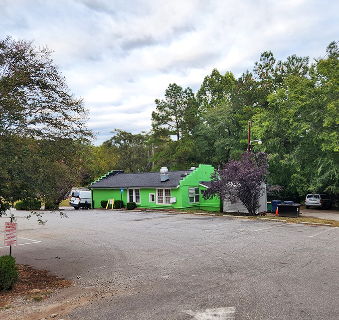 The unmistakable lime-green exterior of Weaver D's stands out like a culinary beacon, promising Southern comfort in every bite.