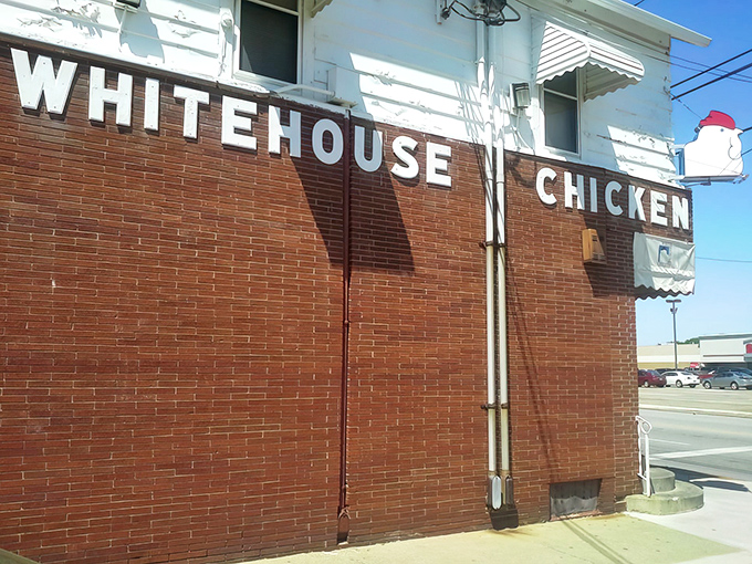 The unassuming brick exterior of White House Chicken in Barberton - proof that culinary greatness often hides behind the simplest facades.