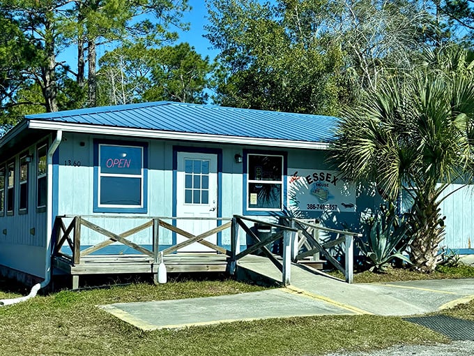 The unassuming blue exterior of Essex Seafood House proves once again that culinary treasures often hide in plain sight.