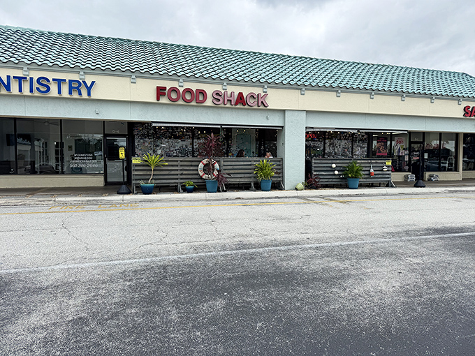 Food Shack&rsquo;s bold red signage commands attention, making a statement about the vibrant character waiting inside.