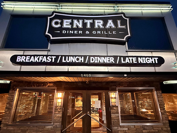 The gleaming white exterior of Central Diner & Grille stands like a culinary lighthouse, beckoning hungry travelers with promises of comfort food paradise.