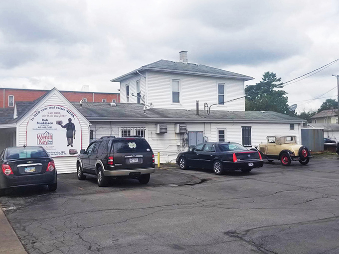 The unassuming white exterior of Whitey's Diner stands like a time capsule of American breakfast culture, promising honest food without pretension.