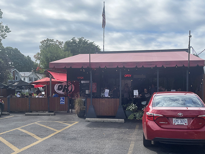The iconic red awning of DK Diner stands out like a breakfast beacon, promising morning salvation for hungry Grandview Heights residents.