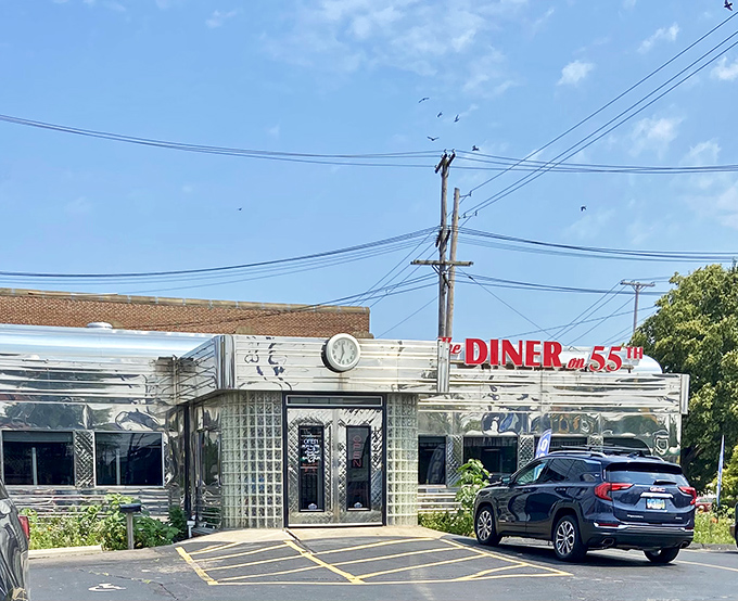 The gleaming stainless steel exterior of The Diner on 55th stands like a time capsule under the Cleveland sky, beckoning hungry travelers with its classic Americana charm. 