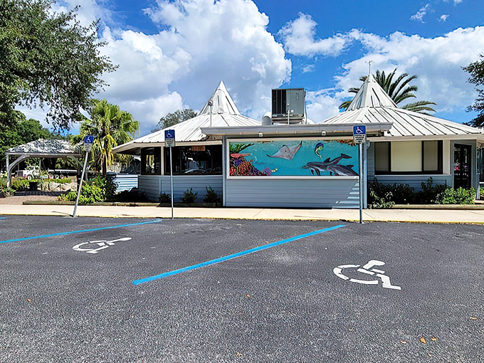 The unassuming exterior of Dixie Crossroads hides culinary treasures within. Like finding a pearl in an oyster, this Titusville landmark delivers seafood surprises.