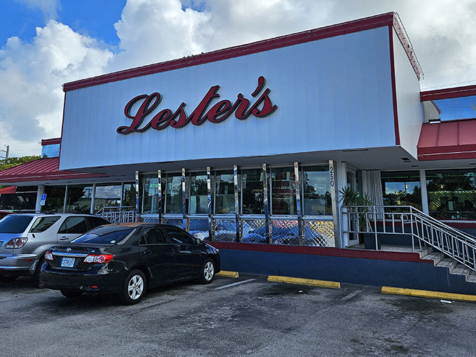 The iconic white and red exterior of Lester's Diner stands as a beacon of breakfast hope in Fort Lauderdale, promising comfort food that's worth the drive. 