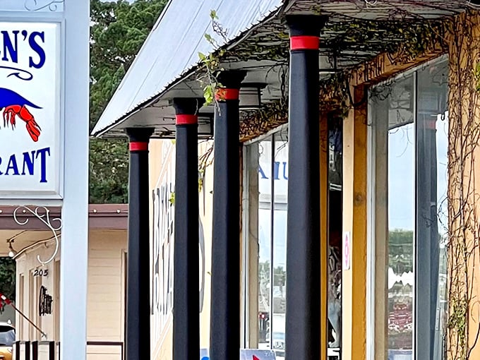 The iconic black columns and simple exterior of O'Steen's Restaurant prove that architectural flourishes are unnecessary when the food speaks volumes.