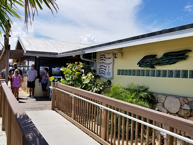 The entrance to paradise doesn't need a fancy gate. JB's Fish Camp welcomes you with Florida sunshine and the promise of seafood that'll make you swoon.