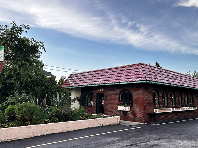 The unassuming brick exterior with its distinctive red-tiled roof hides culinary treasures within. Like finding a Persian palace in suburban Pennsylvania.