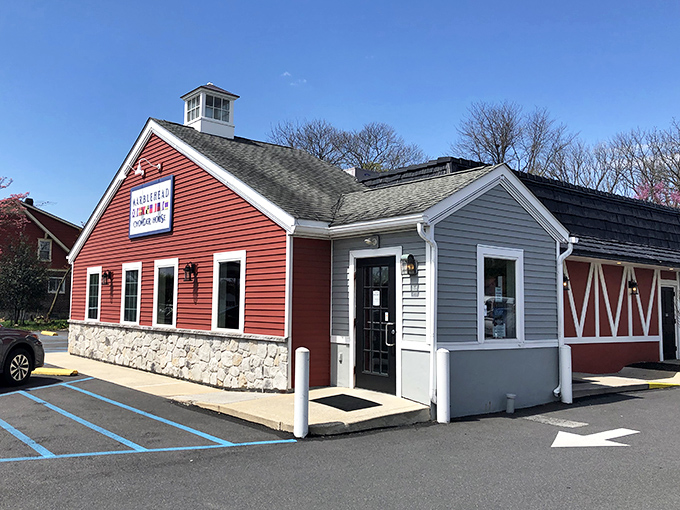 The iconic red barn exterior of Marblehead Chowder House stands like a New England lighthouse in Pennsylvania, beckoning seafood lovers from miles around.