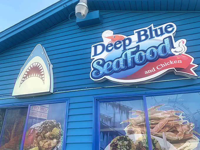 Outside, Deep Blue Seafood pops like a roadside postcard&mdash;shark grin, bold colors, and a promise of flavor.