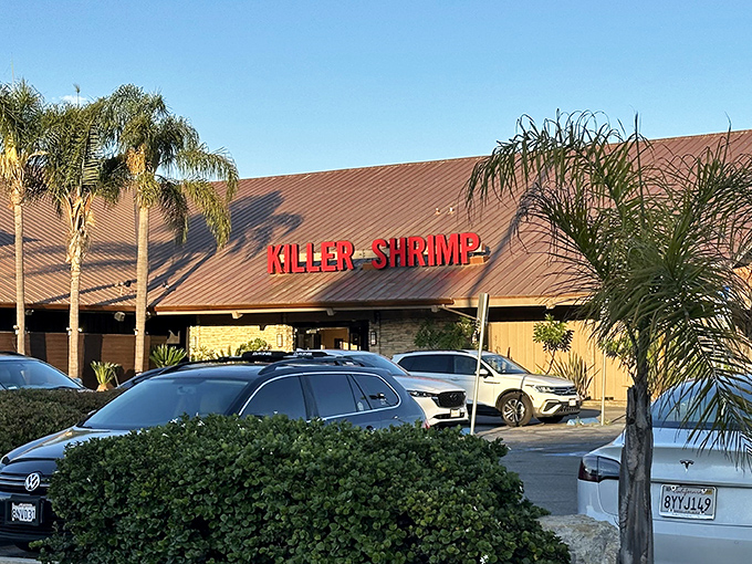 Palm trees stand guard outside Killer Shrimp's unassuming exterior, like bouncers protecting a secret culinary treasure in Marina Del Rey.