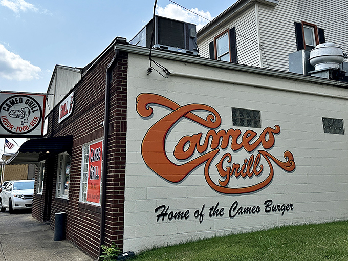 The brick facade and vintage signage of Cameo Grill stands as a beacon of burger perfection in Massillon, where culinary legends are born without pretense.