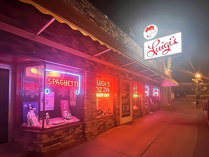 Luigi's iconic red brick exterior stands as a beacon of pizza perfection in Akron, complete with that charming vintage sign that's been guiding hungry patrons for generations.