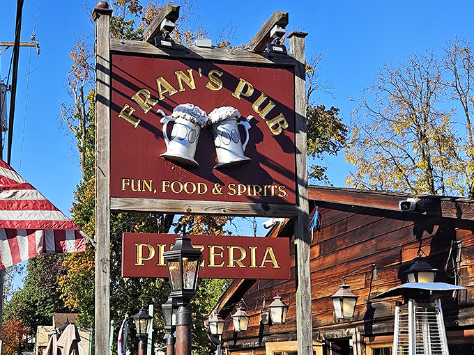 That iconic red sign with clinking beer mugs says it all - "Fun, Food & Spirits" isn't just a tagline, it's a promise kept at Fran's Pub.