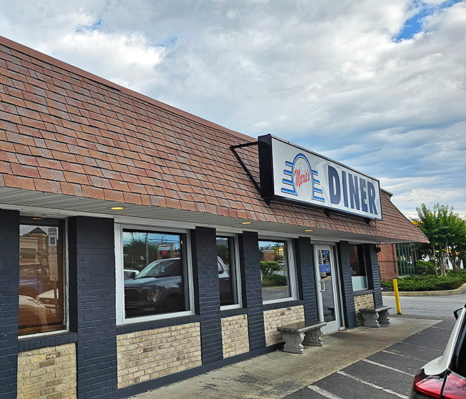 The unassuming exterior of Marie's Diner in La Plata might not stop traffic, but locals know this modest brick building houses culinary treasures worth any detour.