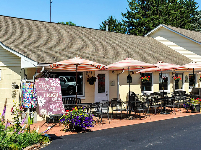 Summer afternoons were made for this patio. The "Live, Love, Laugh" sign isn't just decoration &ndash; it's the inevitable result of dining here.
