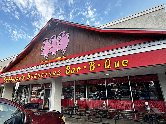 Those dancing pink pigs on the sign aren't just cute mascots&mdash;they're a promise of the smoky delights waiting inside Bubbalou's wood-paneled sanctuary.