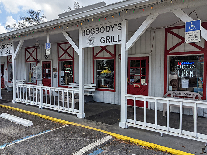 The unassuming white exterior with barn-red accents might fool you, but locals know this modest building houses BBQ treasures worth crossing county lines for.