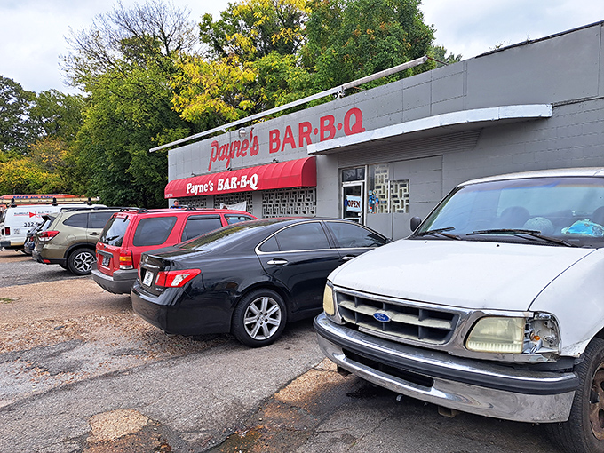 The unassuming facade of Payne's Bar-B-Q stands as Memphis' best-kept open secret, where barbecue dreams come true behind that weathered red awning.