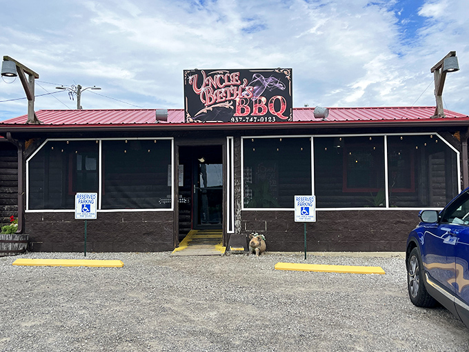 A faithful canine guardian keeps watch outside Uncle Beth's. Even dogs know where the good stuff is cooking in North Lewisburg!
