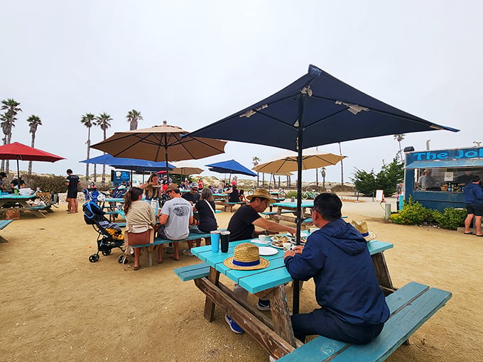 The weathered blue shack with "The Jolly Oyster" painted across the top isn't trying to impress anyone&mdash;until you taste what's inside. California coastal dining at its most honest.