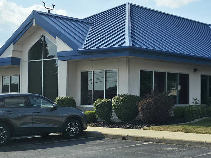 The unassuming blue-roofed exterior of Tony's might not scream "barbecue legend," but that's part of its charm. Culinary treasures often hide in plain sight.