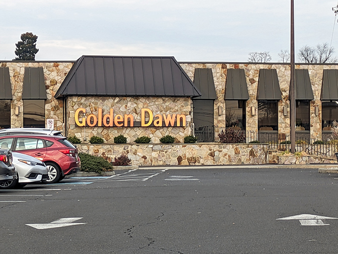 The stone facade of Golden Dawn stands proudly against the blue Pennsylvania sky, like a culinary fortress guarding delicious secrets within.