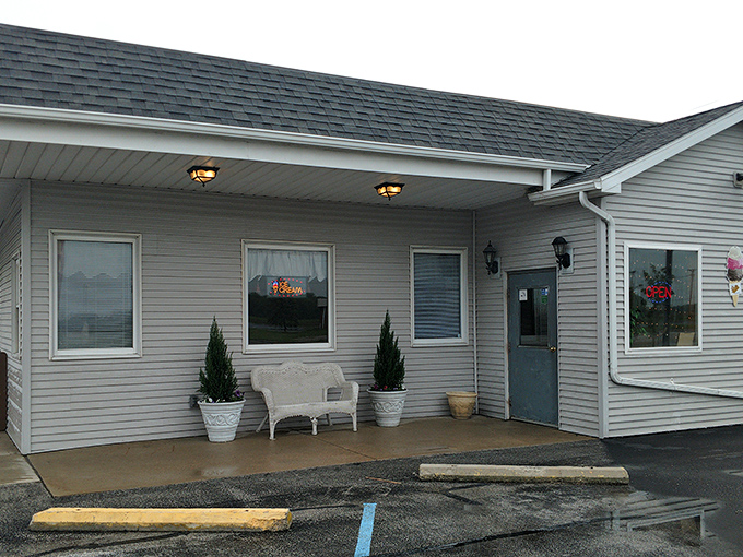 The unassuming exterior of Granny's Kitchen proves once again that culinary treasures often hide behind the simplest facades. That white bench isn't just seating&mdash;it's the waiting room for flavor country.
