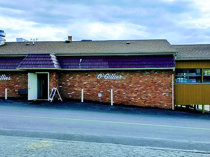 The unassuming brick exterior with its distinctive purple roof trim hides culinary treasures that would make Columbus proud of his discovery.