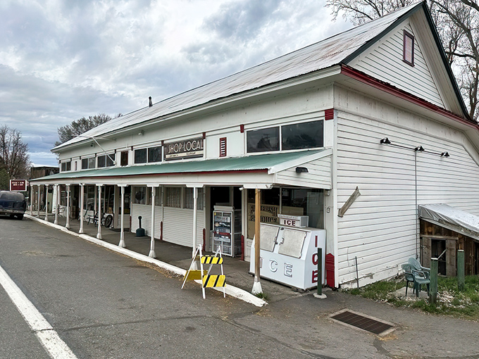 The white clapboard fa&ccedil;ade of Adin Supply Co stands like a time capsule against the vast Modoc County sky, beckoning hungry travelers with promises of rural charm.