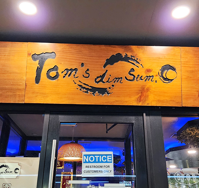 The unassuming exterior of Tom's Dim Sum hides culinary treasures behind that traditional pagoda-style roof. Like finding a Rolex in a cereal box.