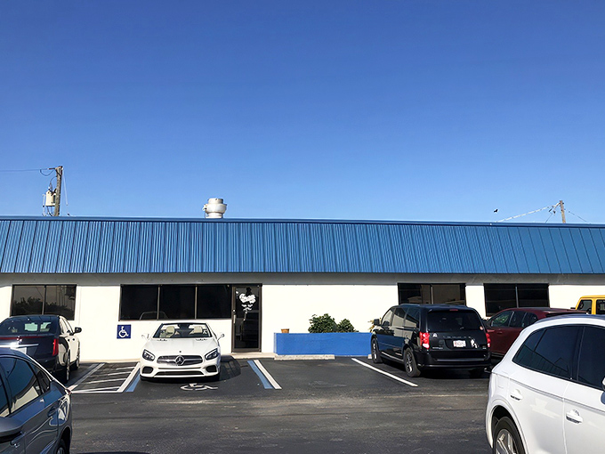 The unassuming blue-roofed exterior of The Blueberry Muffin might not scream "culinary destination," but locals know this Indialantic treasure is where breakfast dreams come true.