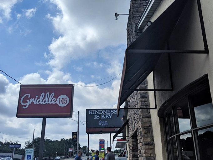 A stone-faced welcome that promises delicious secrets within. Griddle 145's humble exterior hides breakfast treasures that will haunt your dreams.