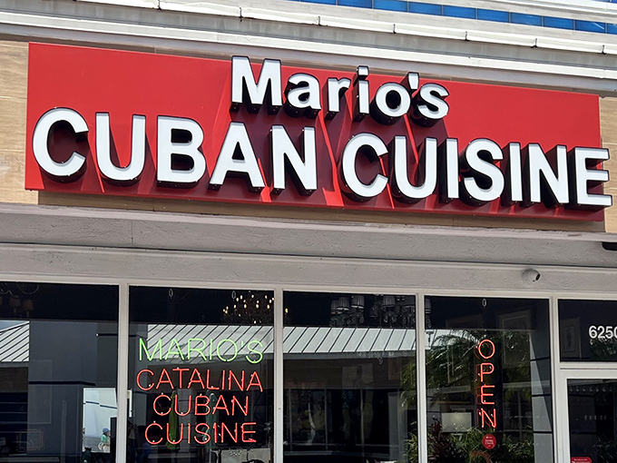 The bold red sign of Mario's Cuban Cuisine stands out like a culinary lighthouse, beckoning hungry travelers to dock their appetites at this Fort Lauderdale gem.