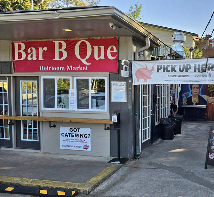 Don't let the humble exterior fool you &ndash; this tiny BBQ joint houses flavor explosions that would make NASA engineers jealous. The red "Bar B Que" banner serves as Atlanta's tastiest treasure map.