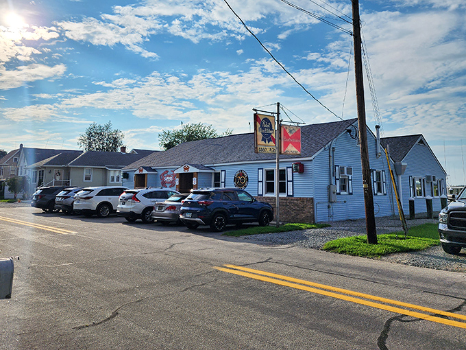 The blue exterior with those giant red crab signs isn't just decoration&mdash;it's nature's way of saying "seafood paradise ahead!"